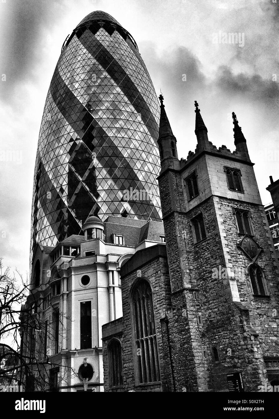 Old church and gherkin Black and White Stock Photos & Images - Alamy