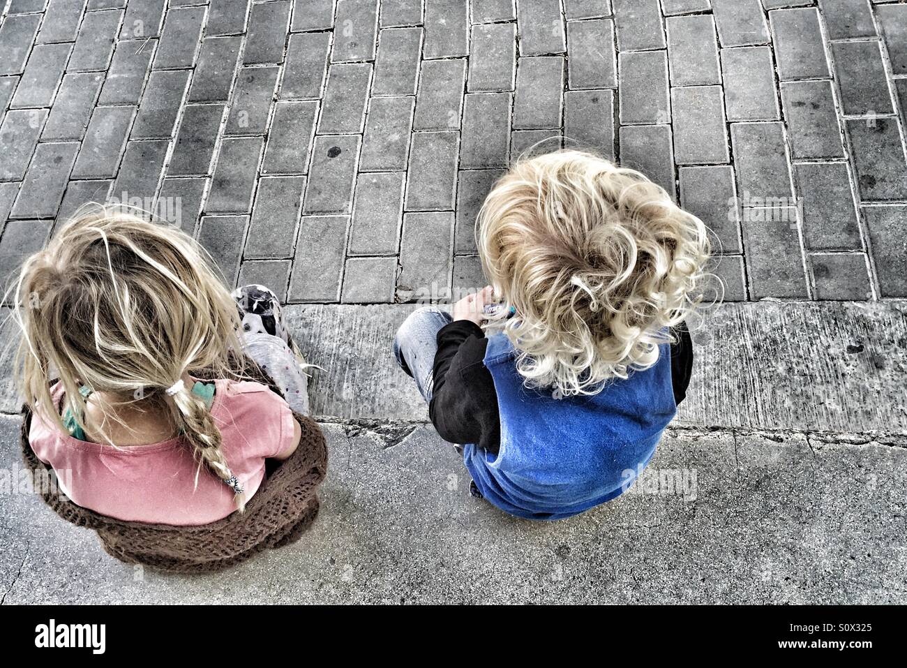 Kids sitting hi-res stock photography and images - Alamy