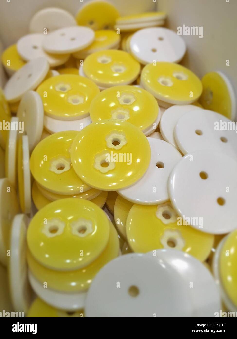 Yellow buttons hi-res stock photography and images - Alamy