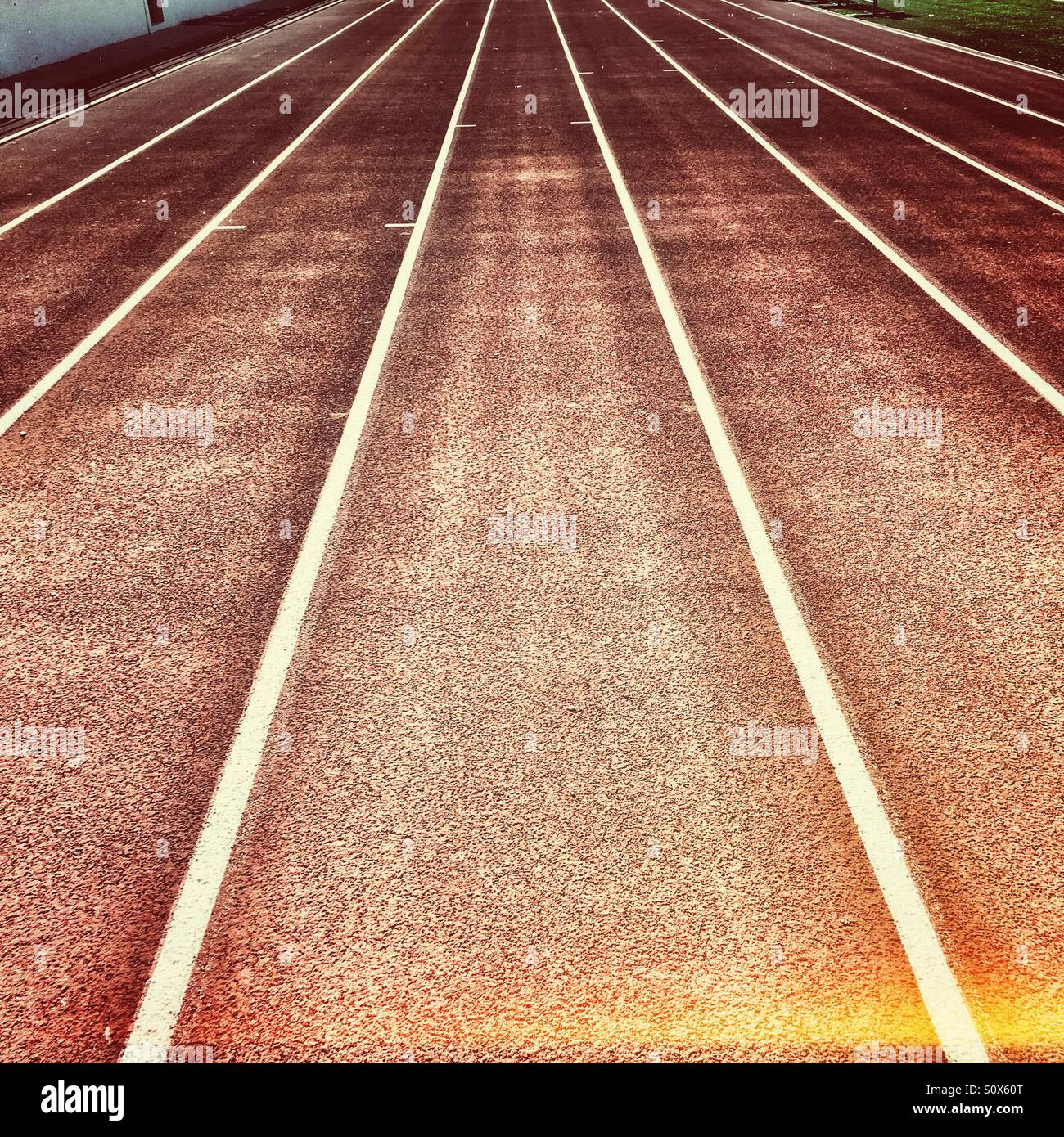 Lanes on a track for running Stock Photo - Alamy