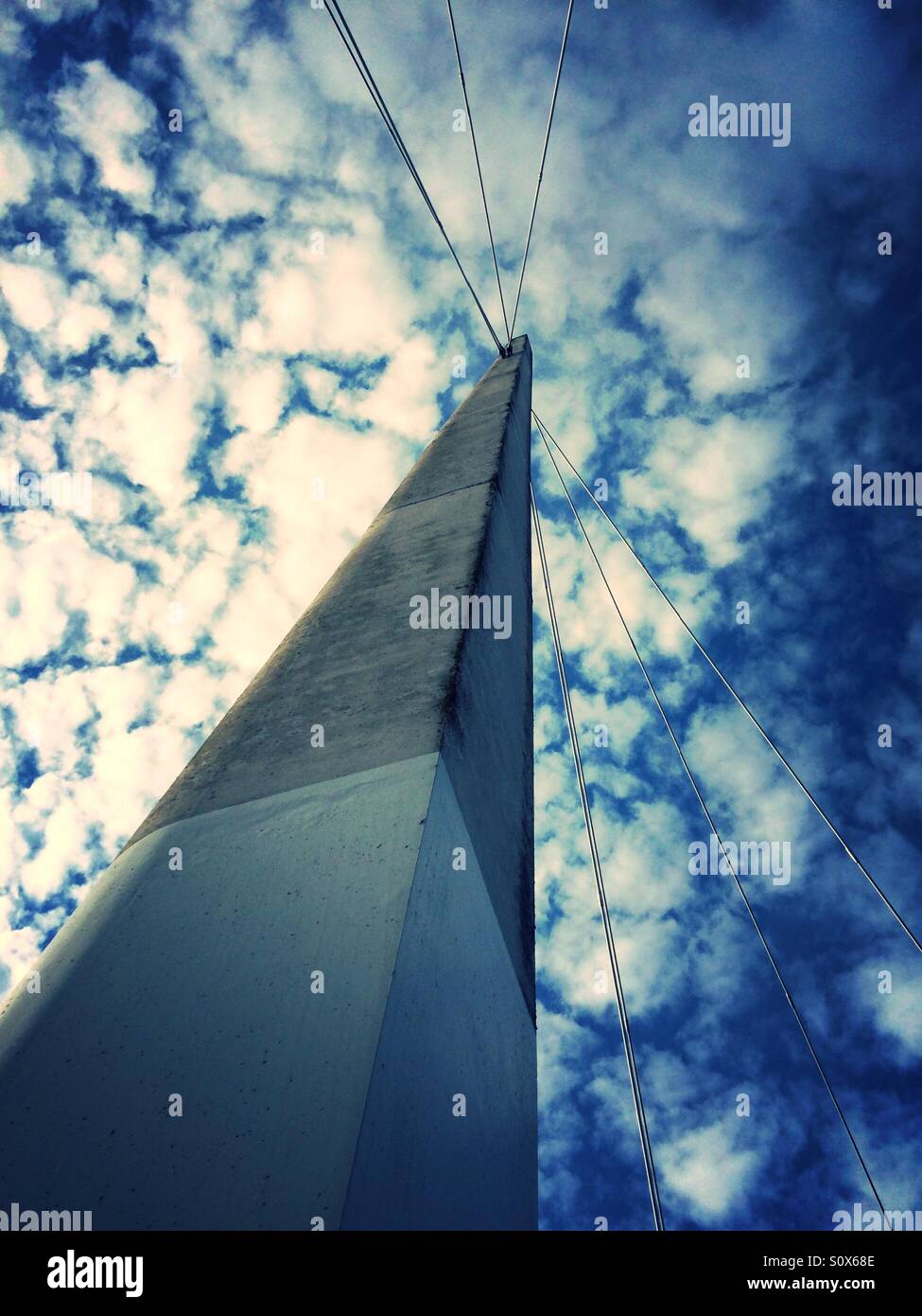 Bridge pillar with supporting wires Stock Photo - Alamy