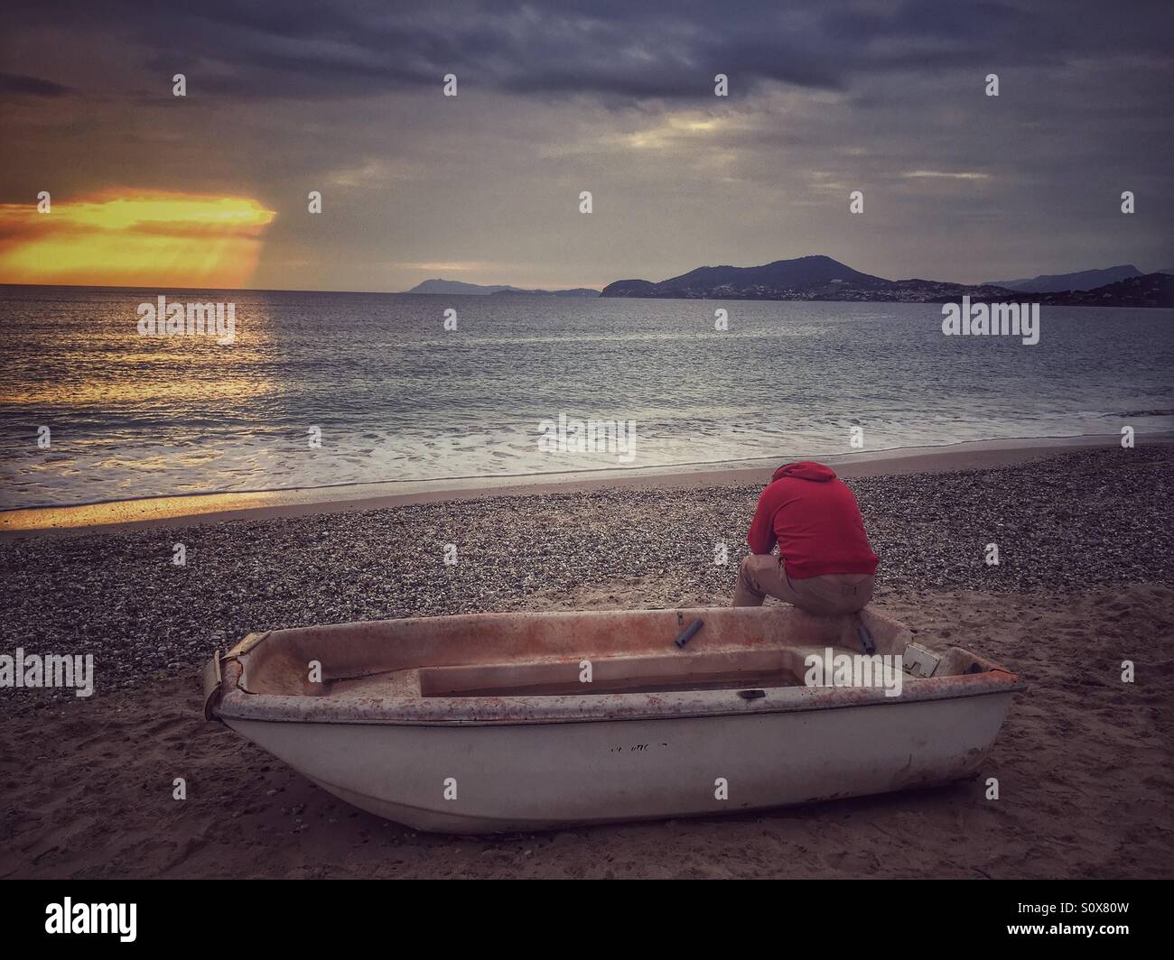 Man sea boat sad hi-res stock photography and images - Alamy