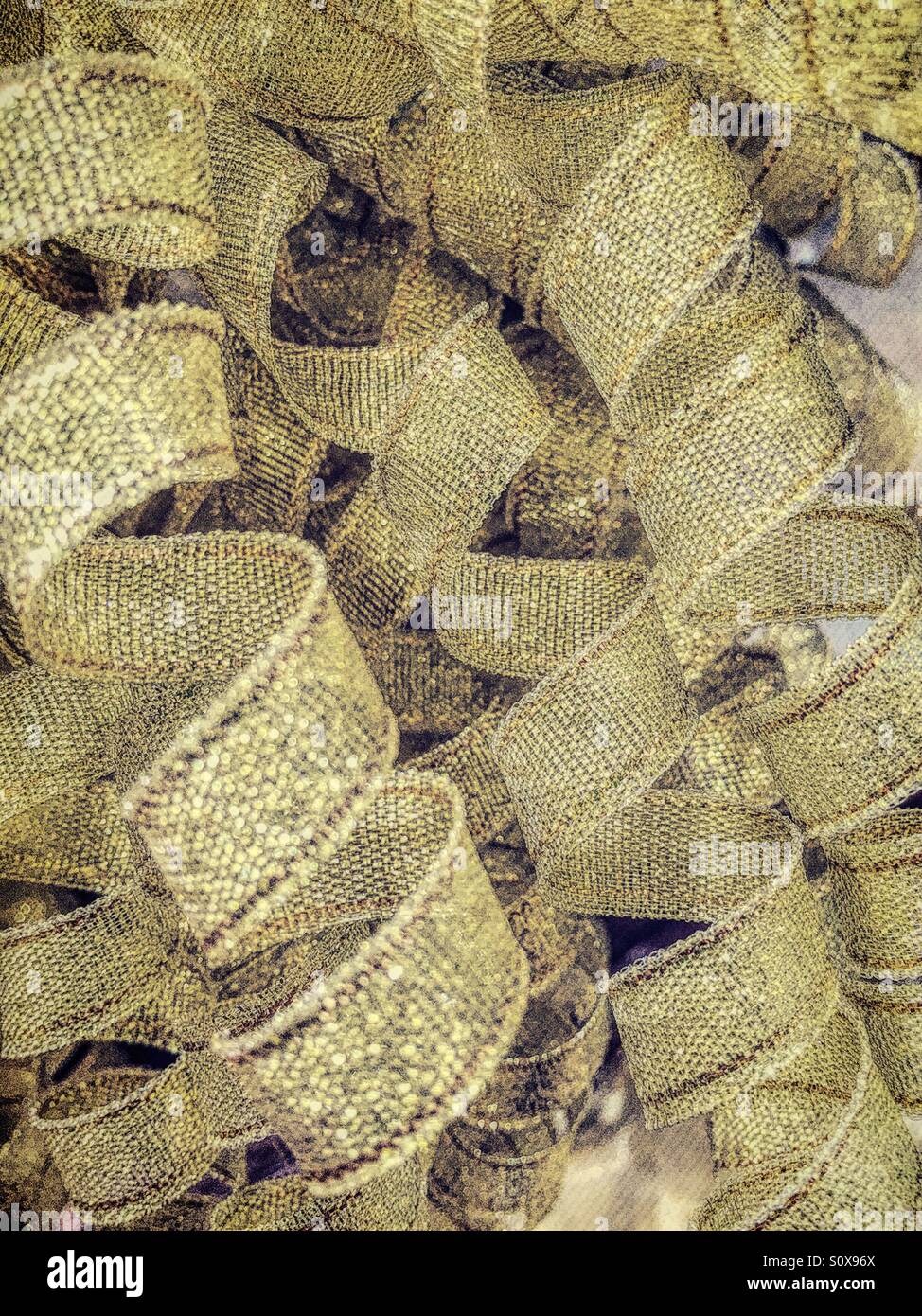 Gold curling ribbon Stock Photo - Alamy