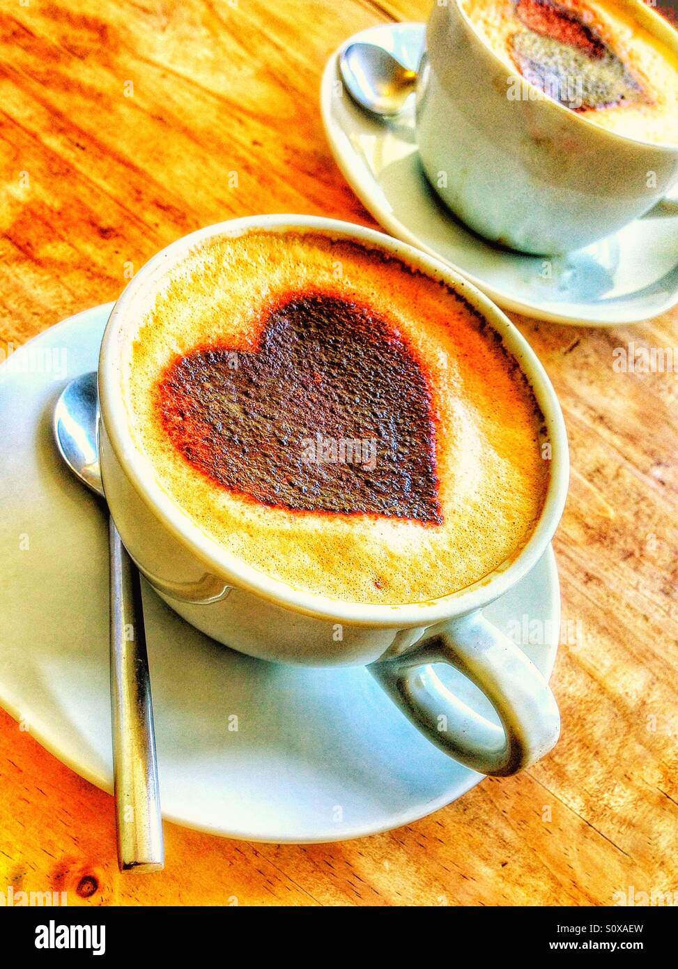 Heart shape in a cup of coffee Stock Photo - Alamy