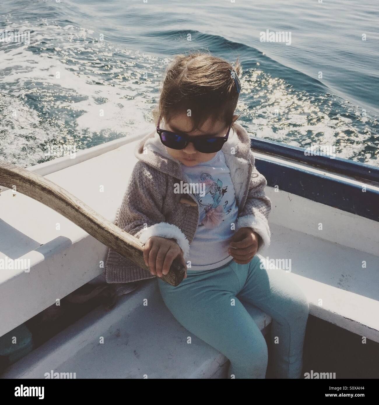 Kid sailor driving hi-res stock photography and images - Alamy