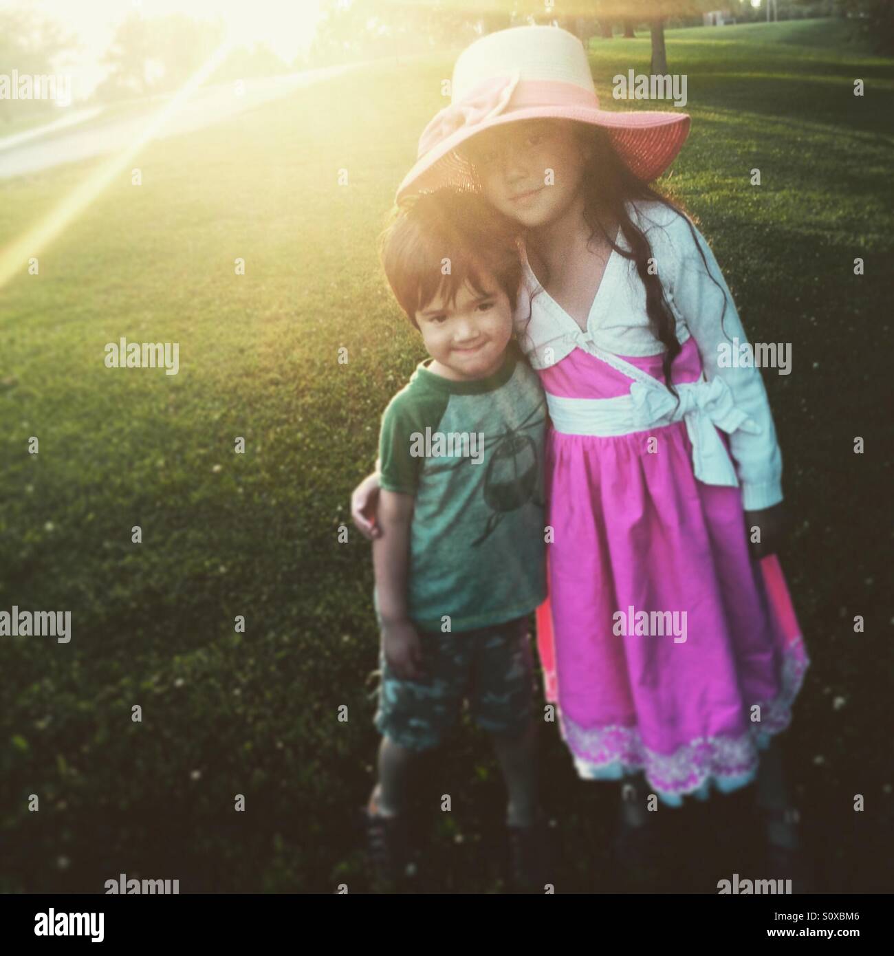 Sister and brother sunset hi-res stock photography and images - Alamy