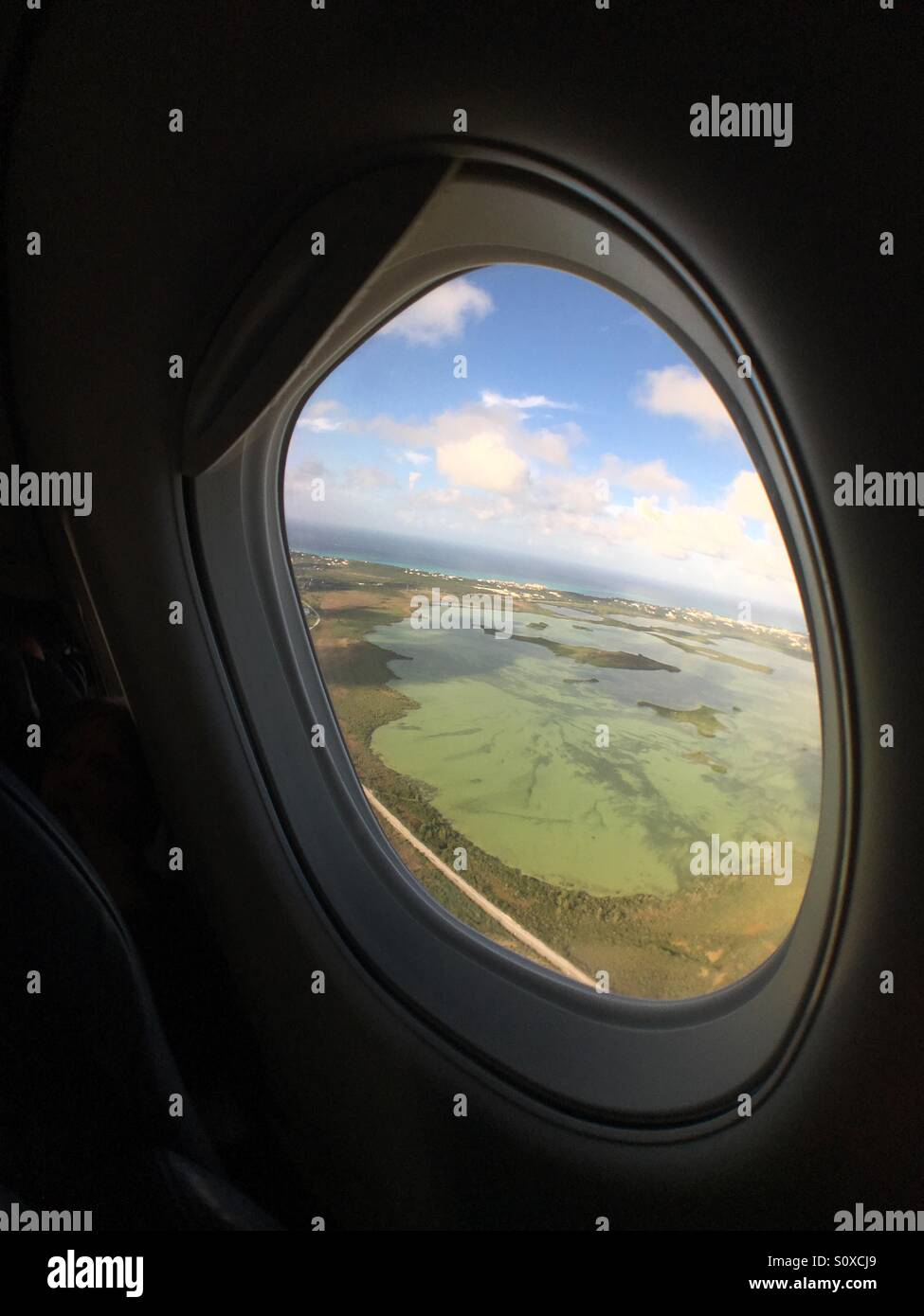 Bahamian lakes through the airplane window; take off from Nassau Stock ...