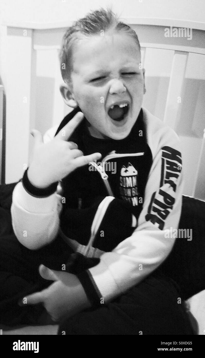 Boy posing in rock n roll Stock Photo - Alamy