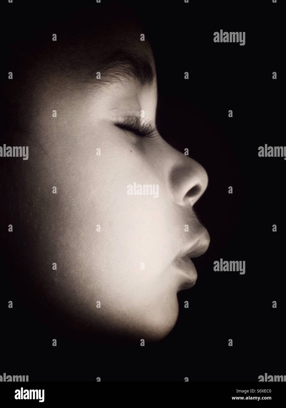 Child face profile side view hi-res stock photography and images - Alamy
