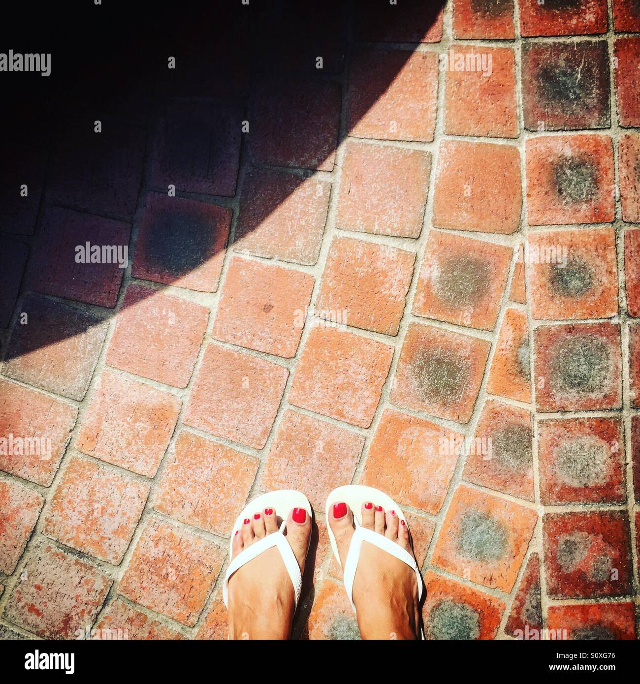 Red painted toes hi-res stock photography and images - Alamy