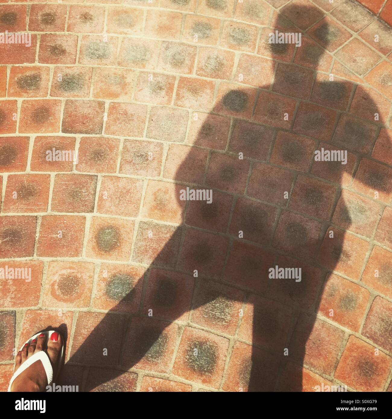 Shadow of person stepping forward Stock Photo - Alamy