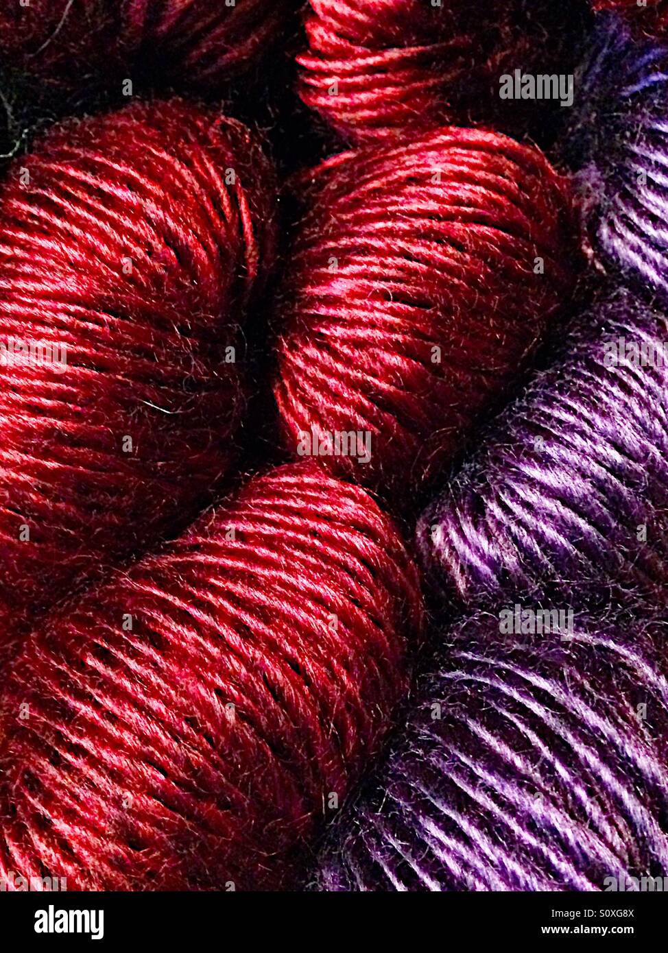 Maroon yarn hi-res stock photography and images - Alamy