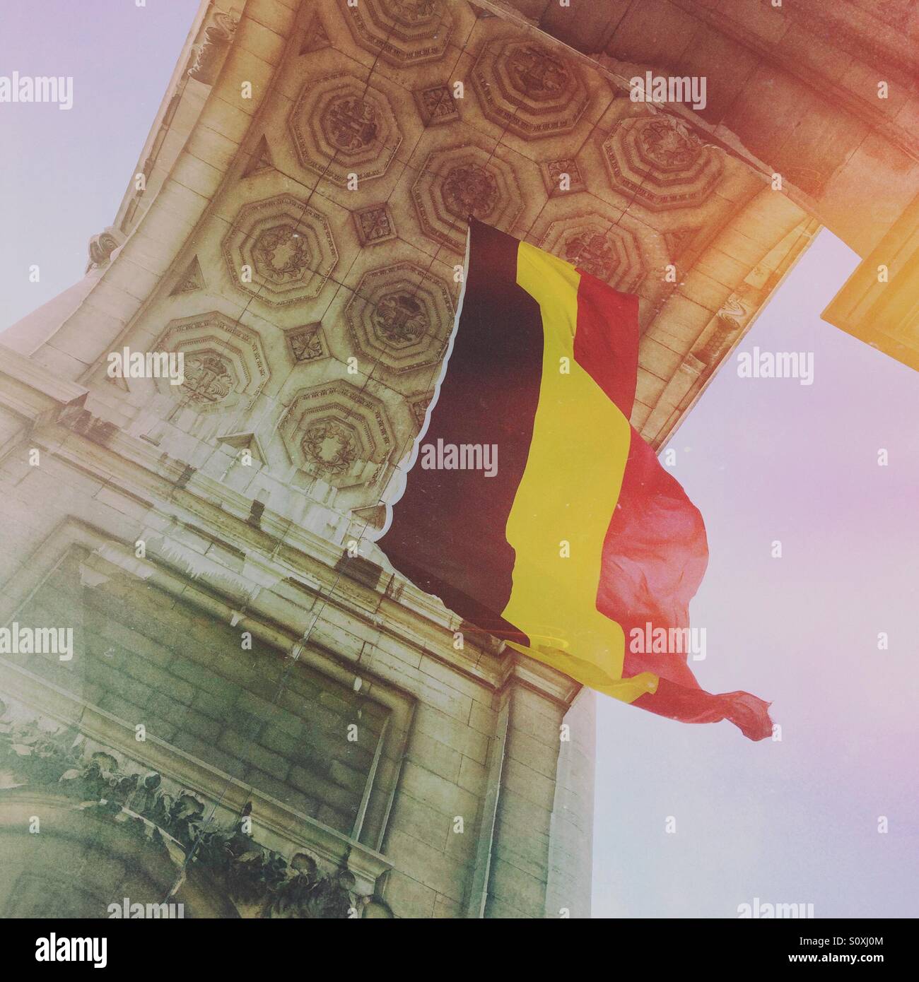 Belgian flag under arc Stock Photo - Alamy