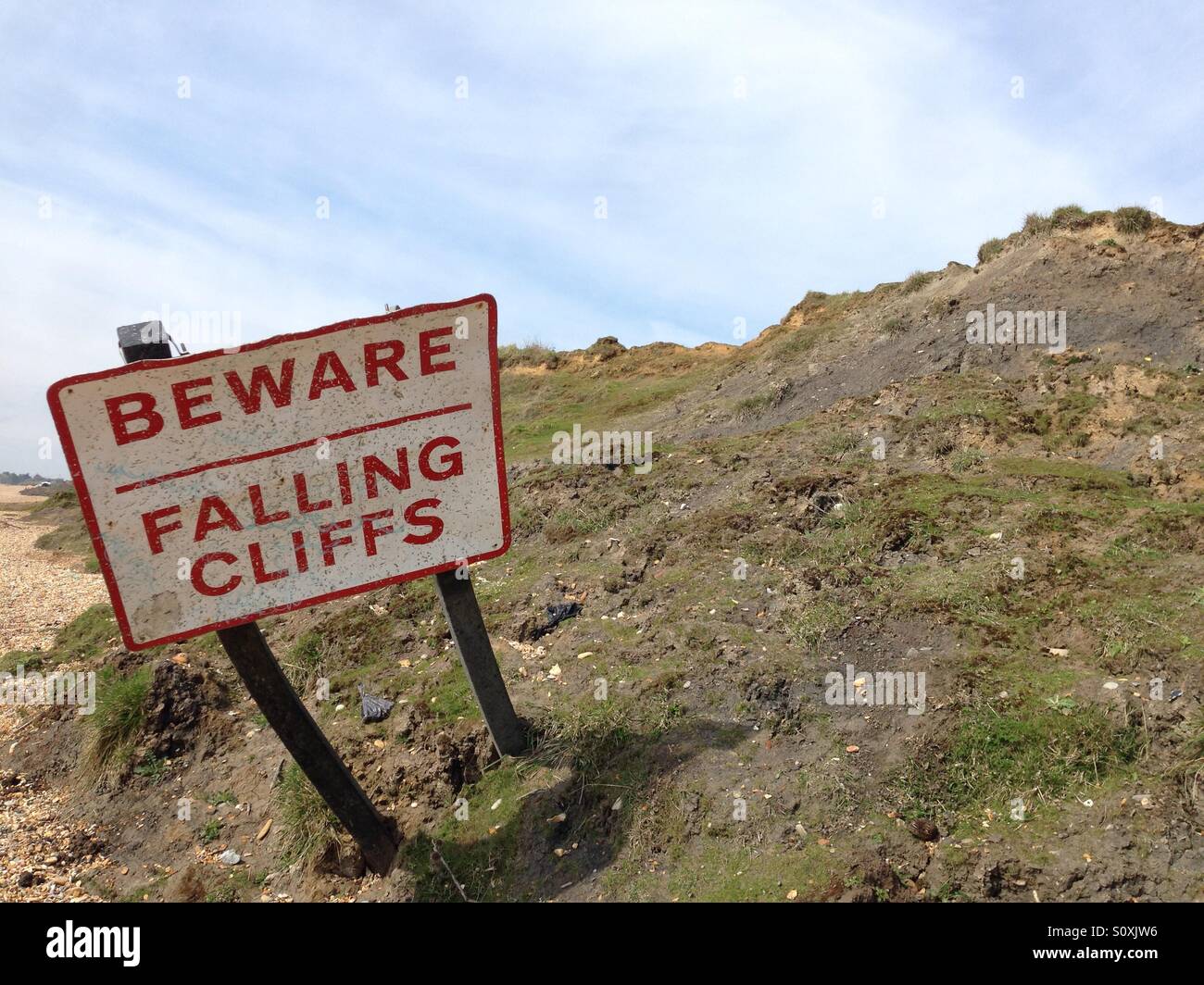 Beware: Falling Sign Stock Photo - Alamy