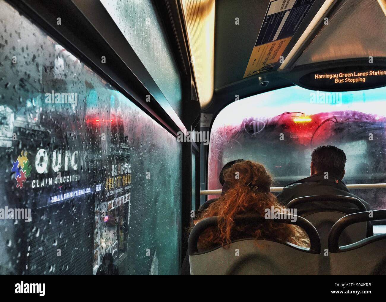 A wet day seen from the window of a double decker bus. Green Lanes ...
