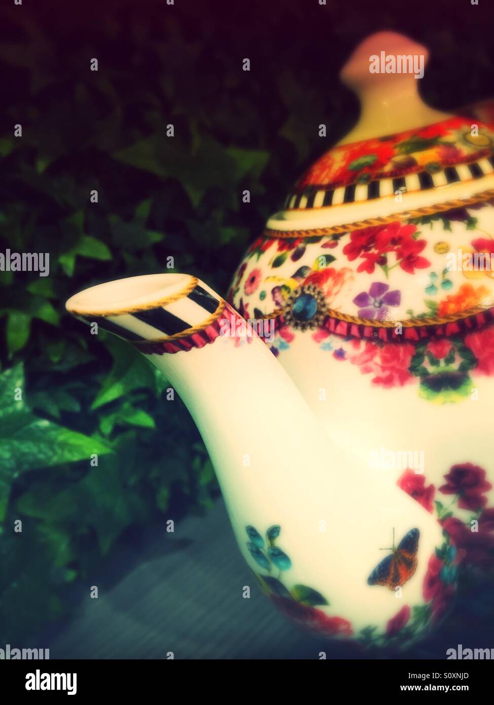 Colorful teapot spout Stock Photo - Alamy