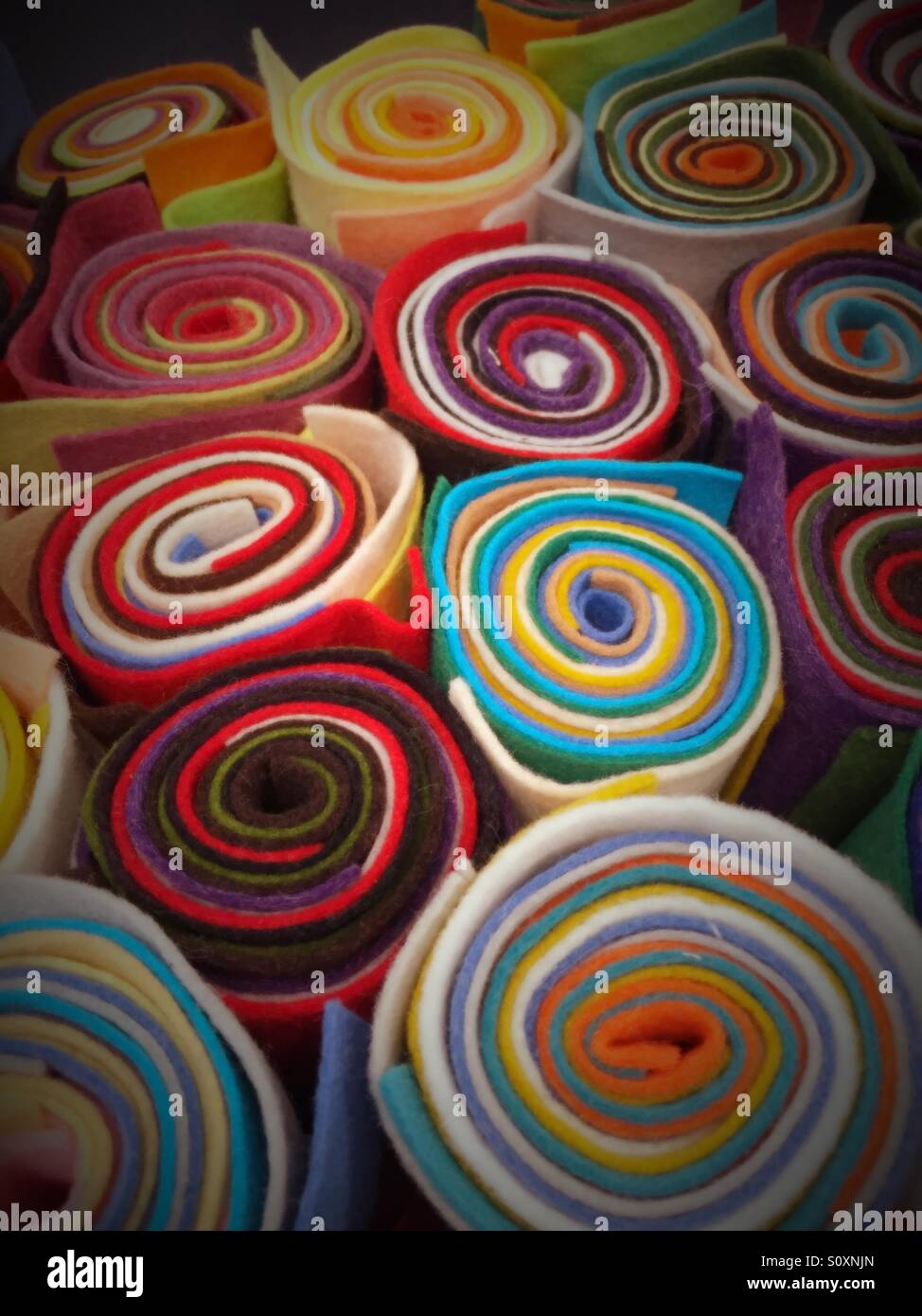 Rolls of colorful felt fabric Stock Photo - Alamy