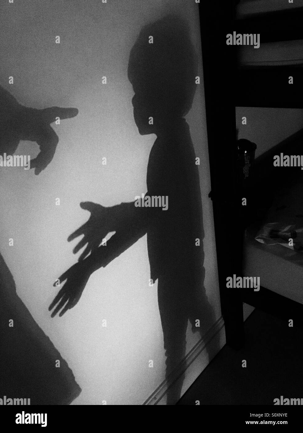 Black shadow hands Black and White Stock Photos & Images - Alamy