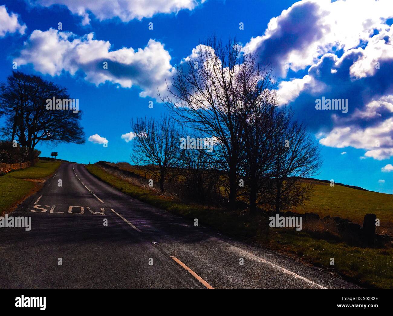 Drive slow road sign hi-res stock photography and images - Alamy