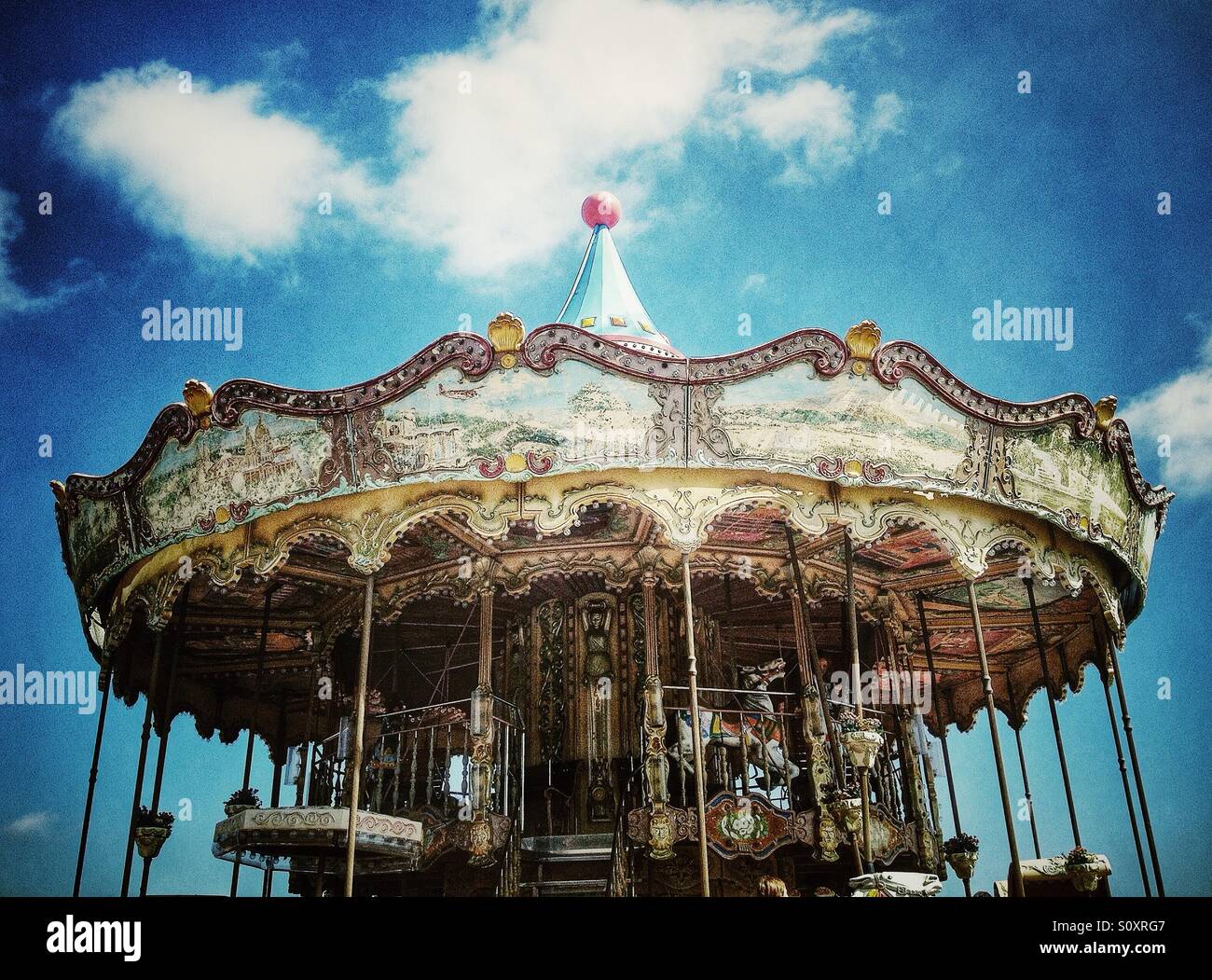 Old carousel in the amusement park Stock Photo - Alamy