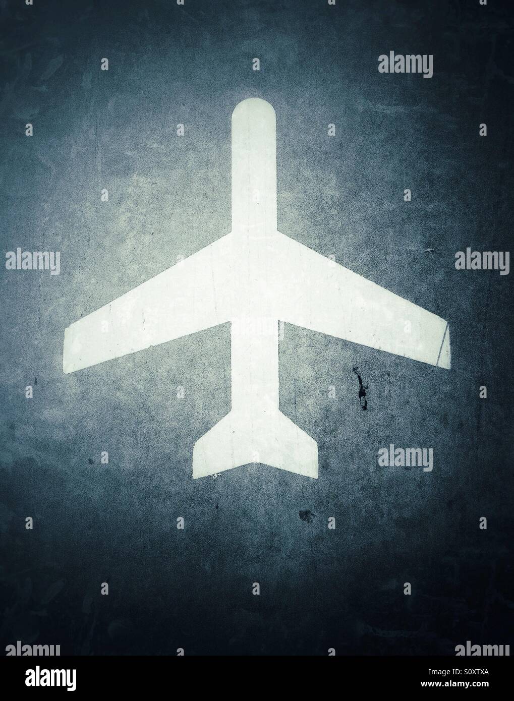 Airplane sign painted on the floor parking of the airport Stock Photo ...