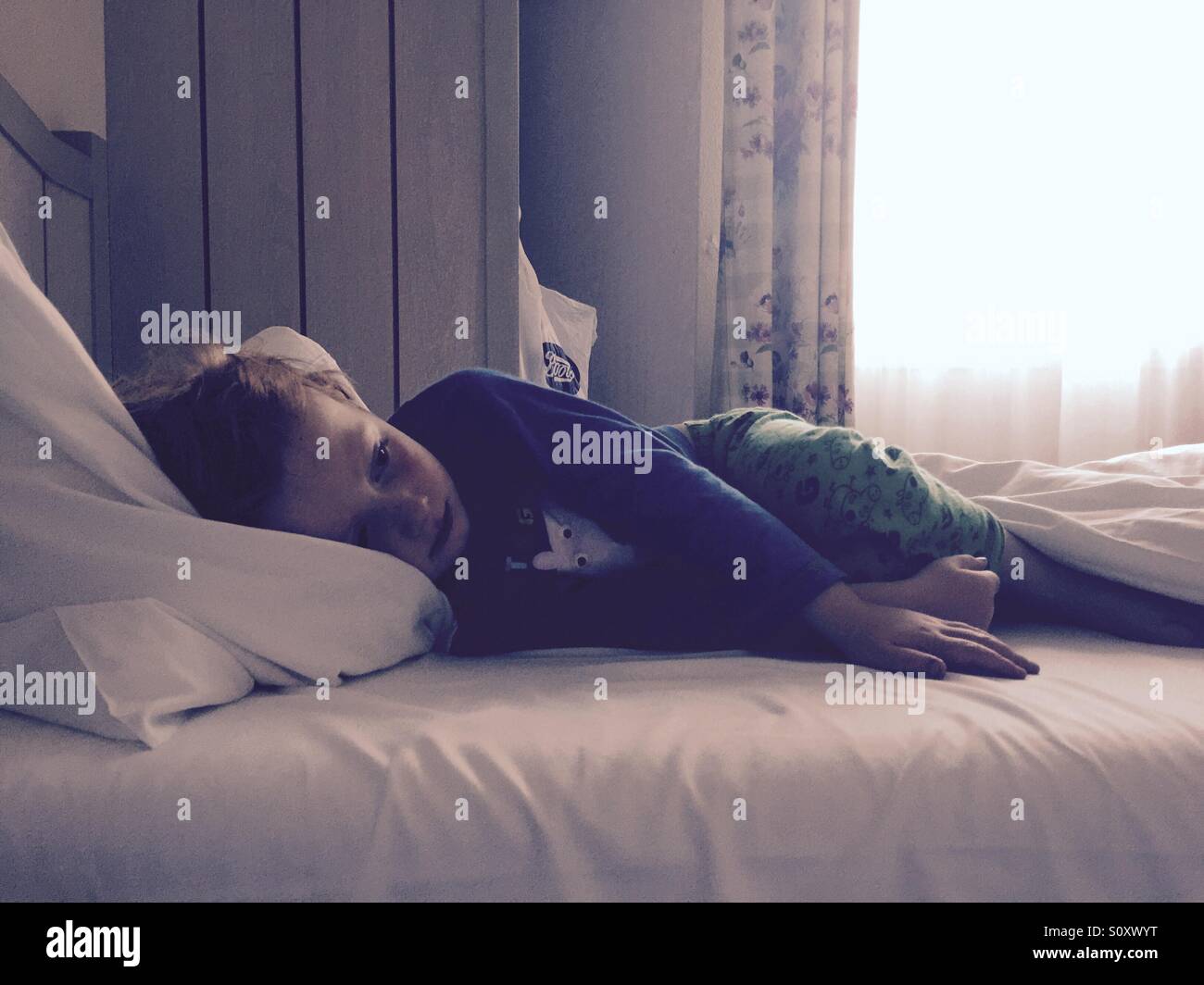 Child unwell hi-res stock photography and images - Alamy