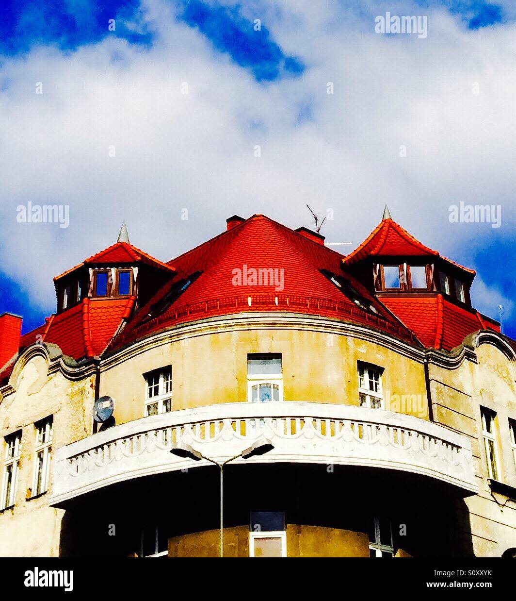 Old building with red roof and sky above, Poland, Silesia, Gliwice ...