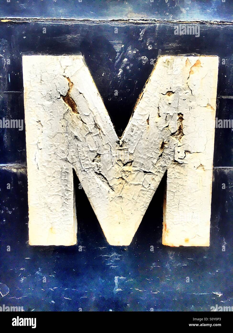 A distressed letter m Stock Photo - Alamy