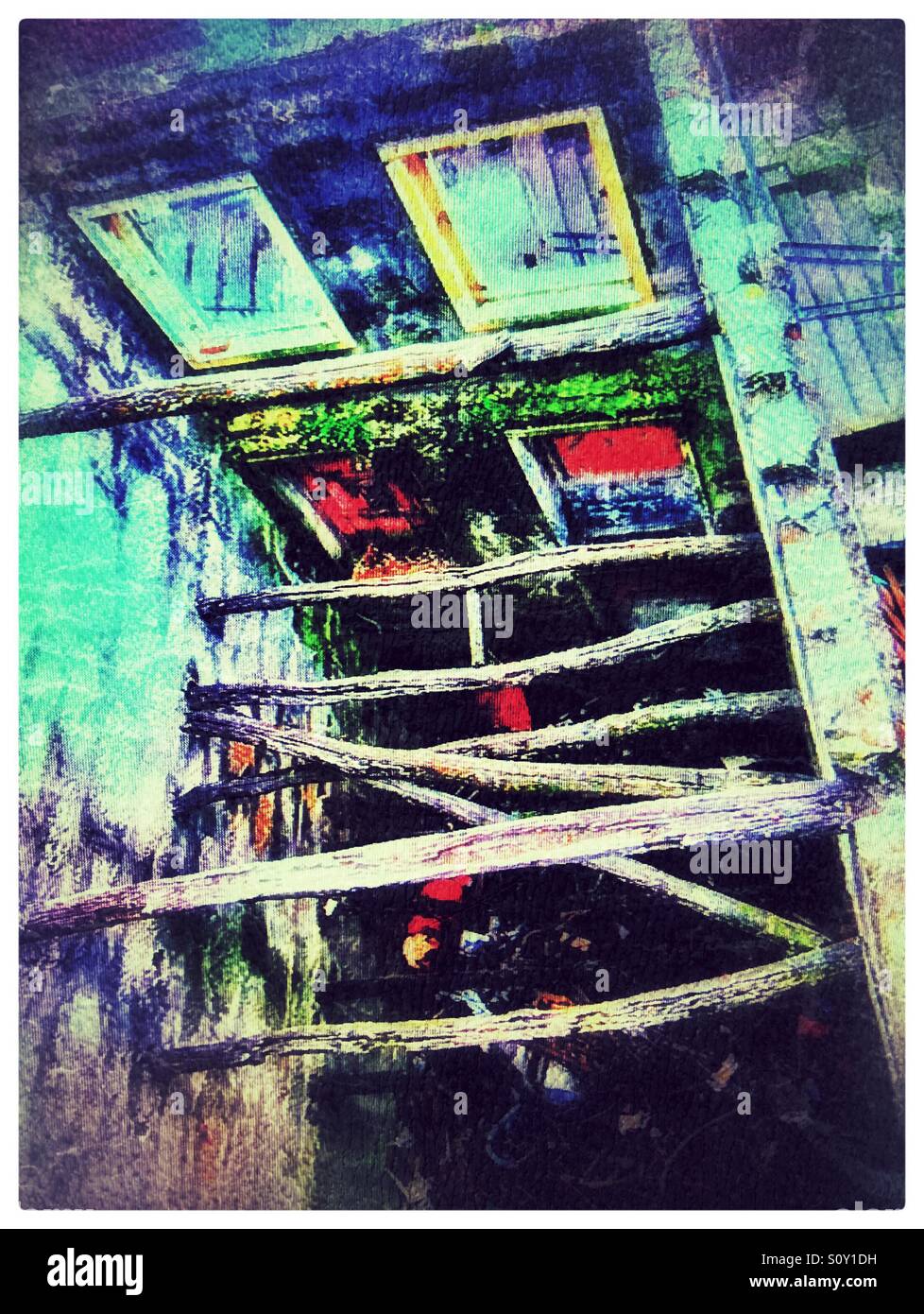 Looking down into abandon rooftop house Stock Photo - Alamy