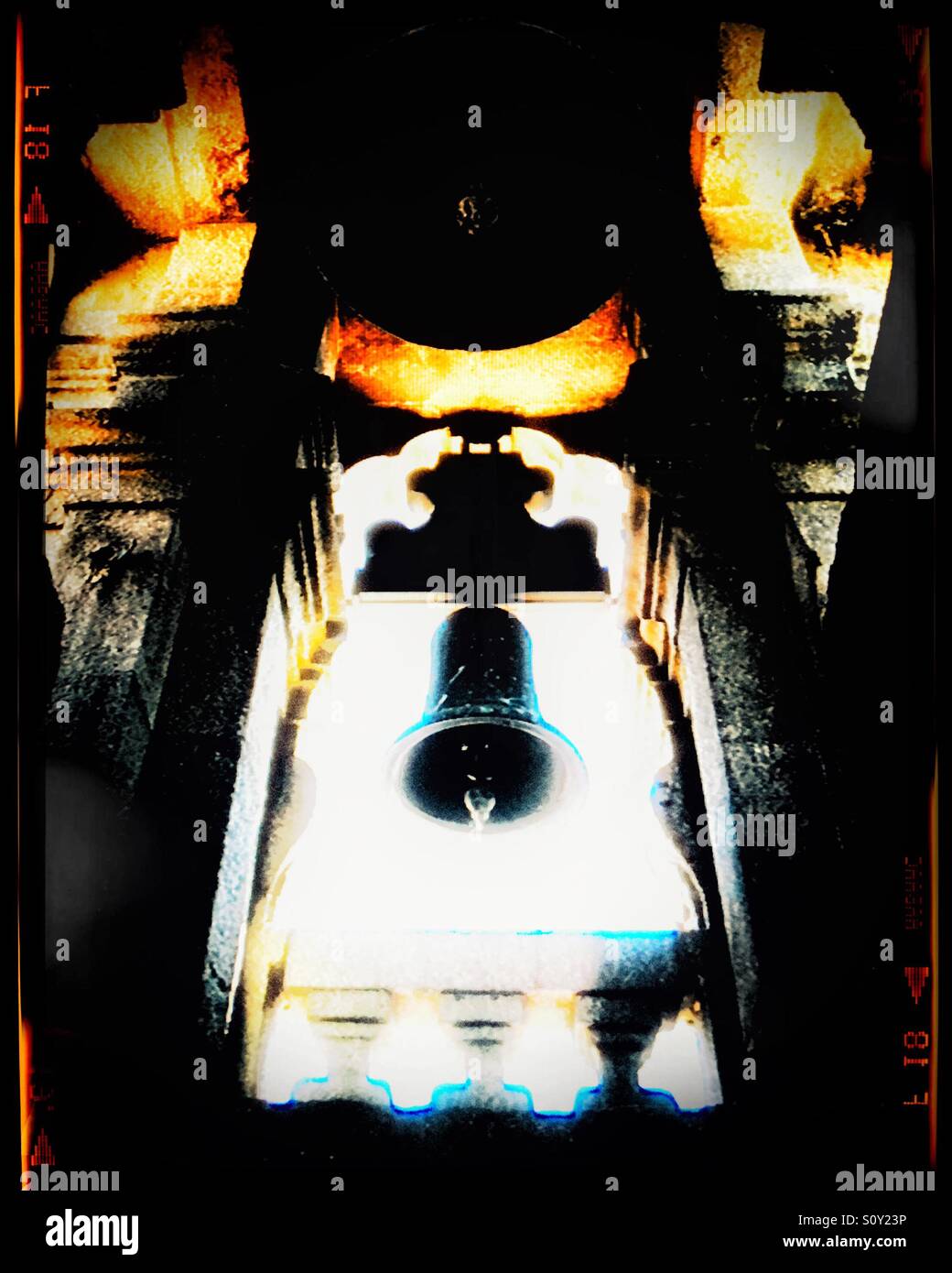 View from underneath bells and a bell tower of a church Stock Photo - Alamy