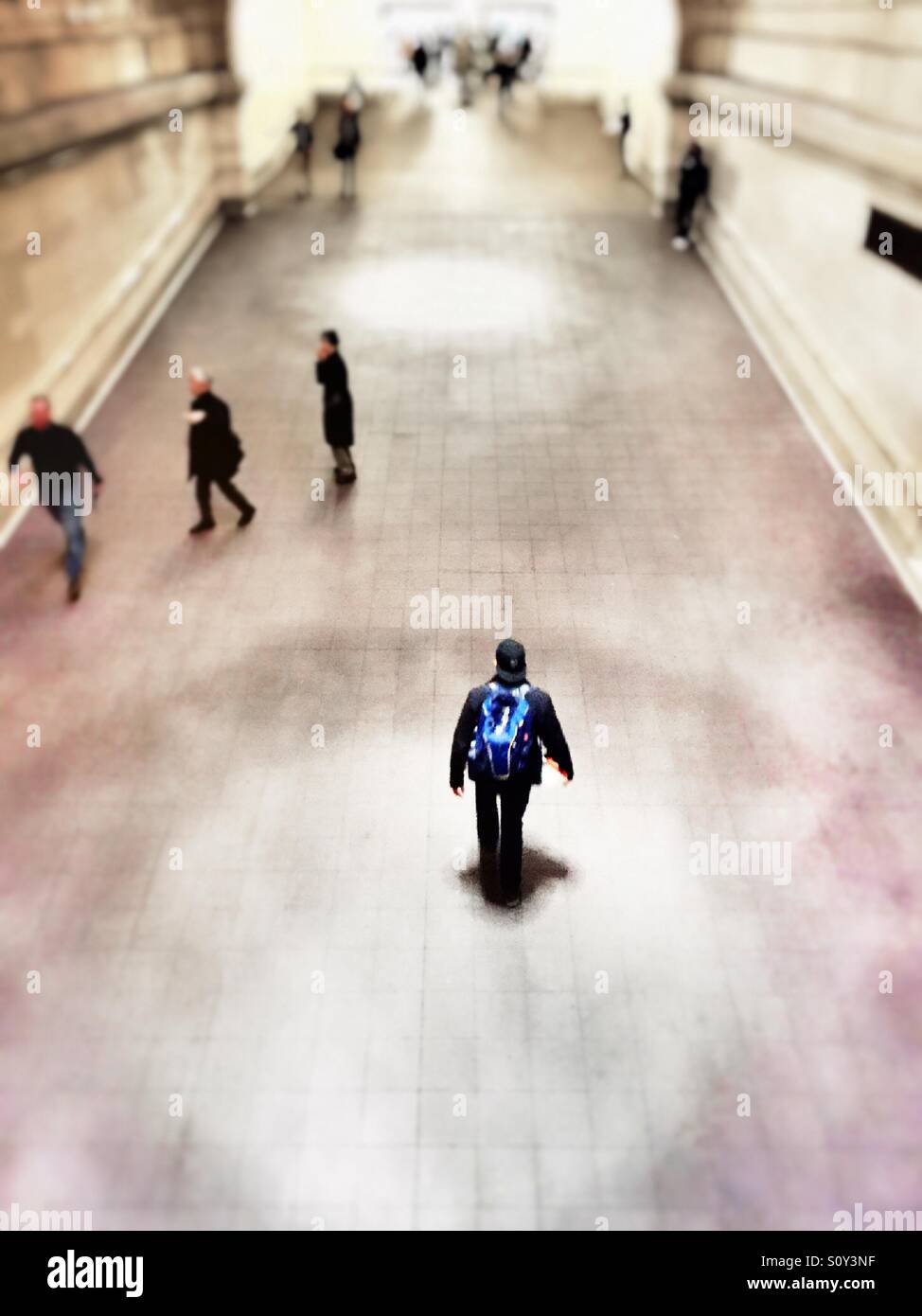 Travelers move up a ramp in Grand Central terminal, New York City, USA ...