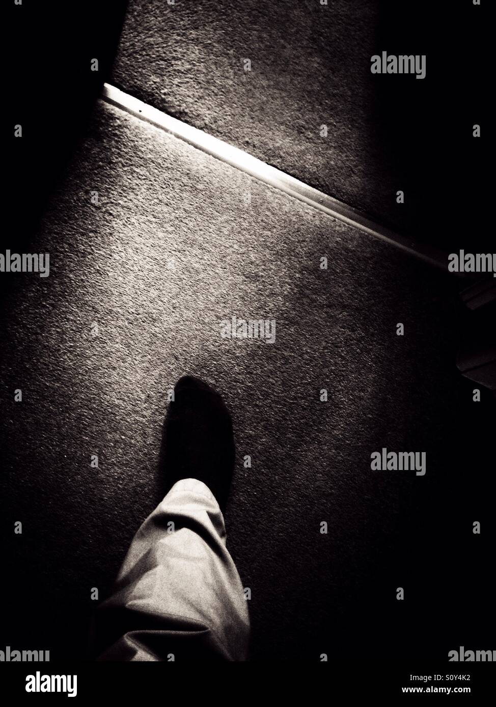 Walking into the light Stock Photo - Alamy