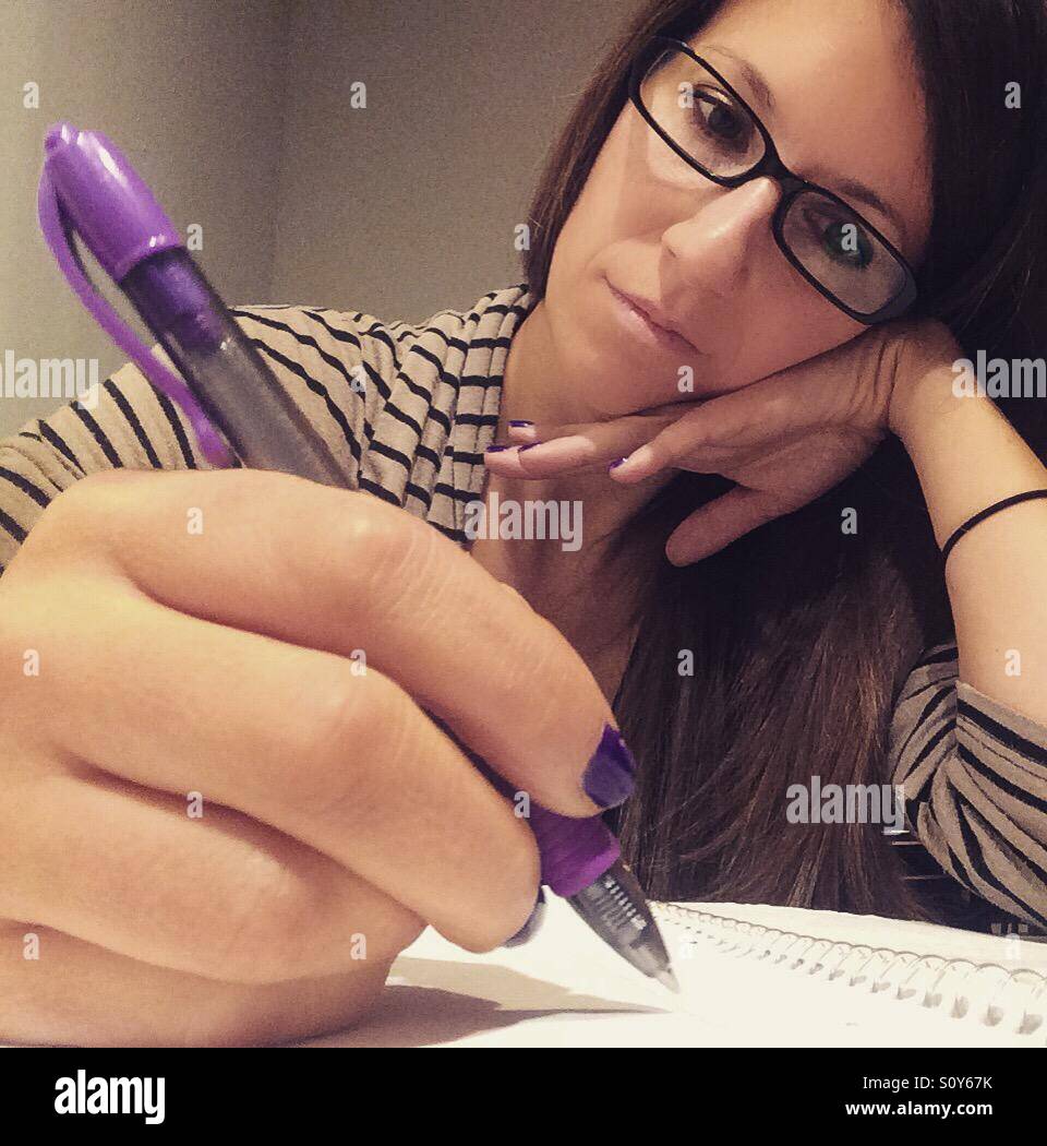 Studious girl hi-res stock photography and images - Alamy Studious girl hi-res stock photography and images - Alamy