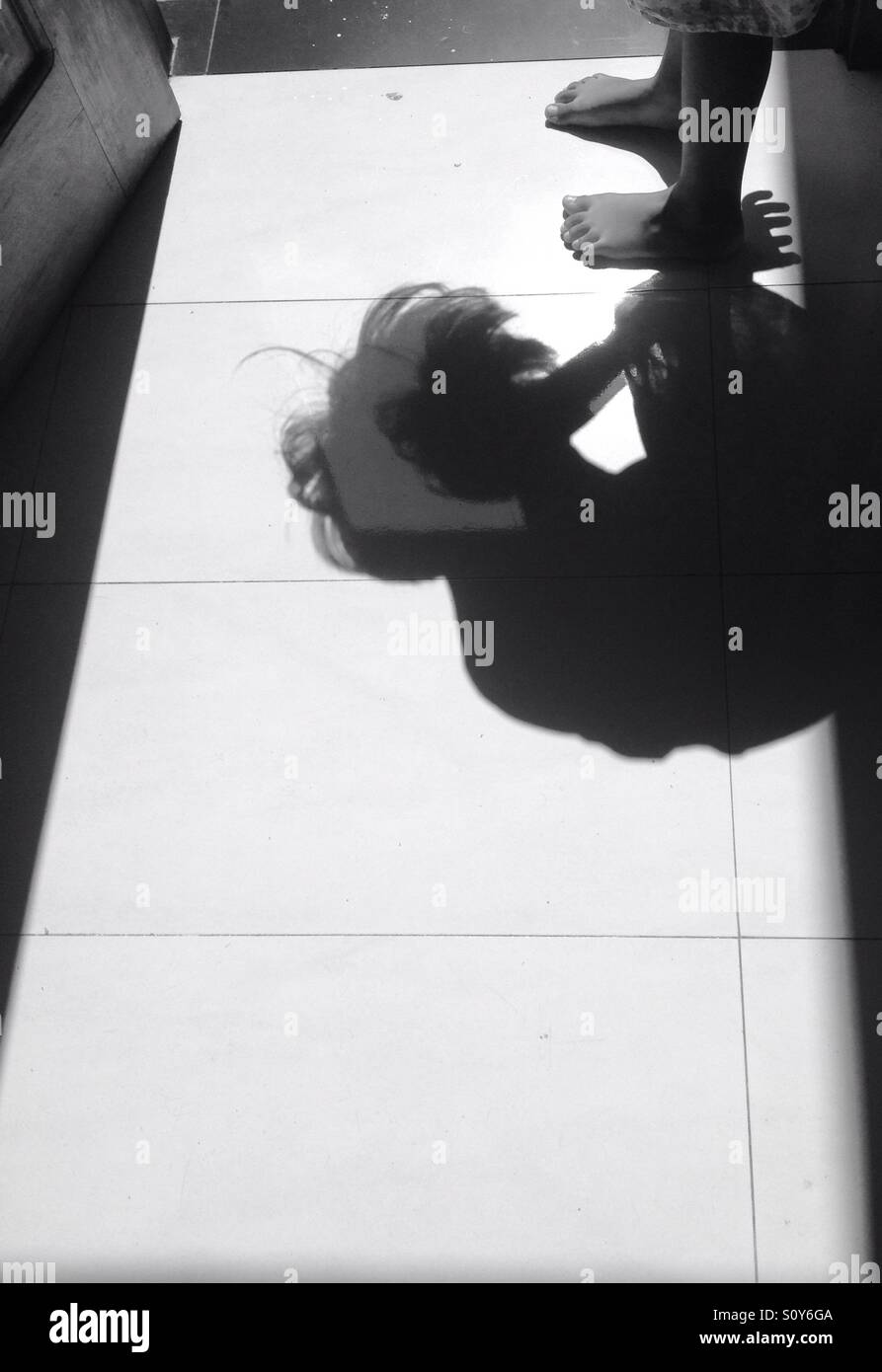 Kid sitting thinking hi-res stock photography and images - Alamy