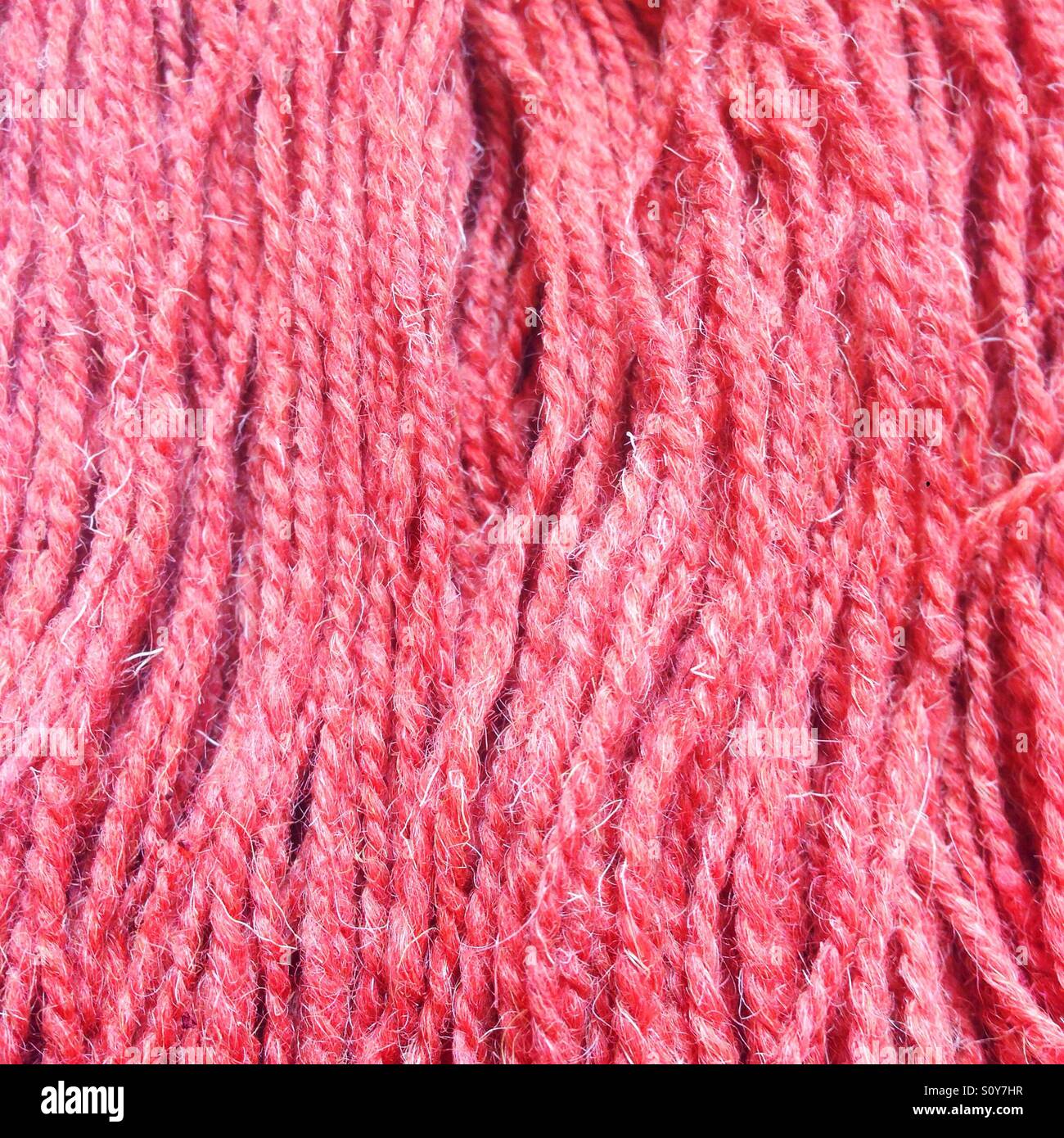 Pink yarn threads Stock Photo - Alamy