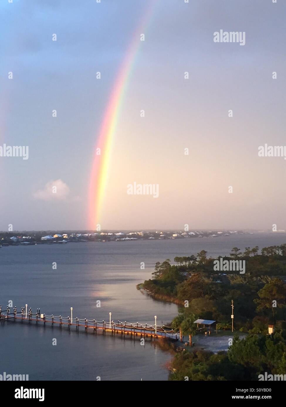 Rainbow at the Beach Stock Photo - Alamy