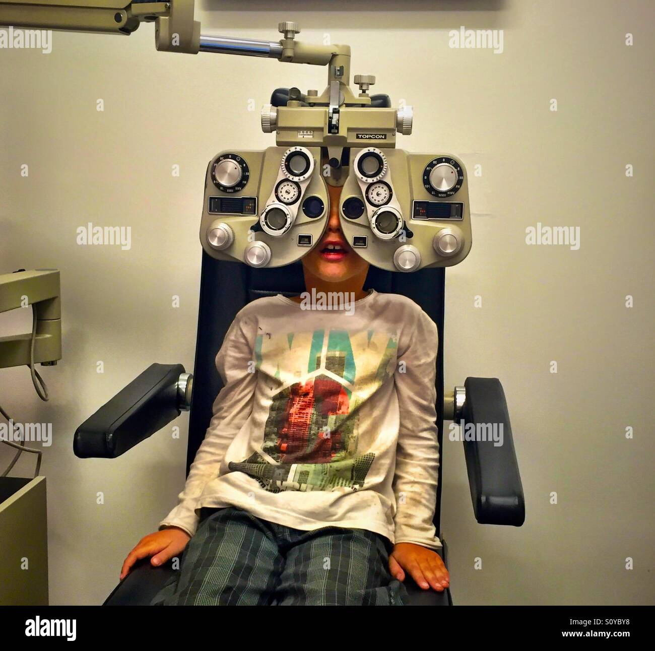 Eye test for 7 year old boy Stock Photo - Alamy