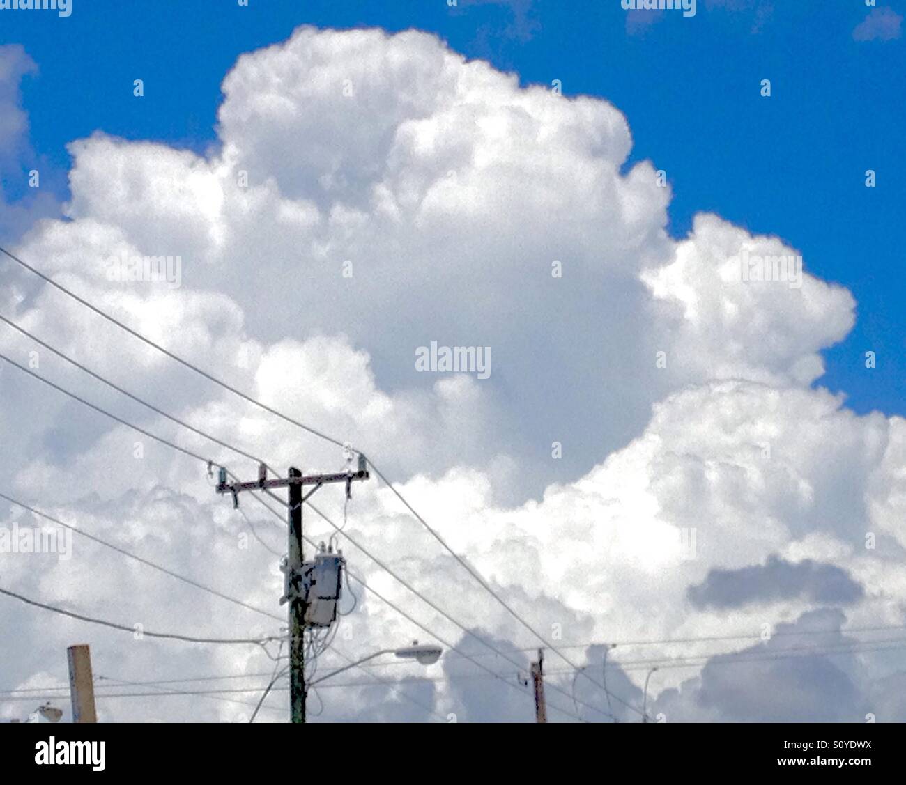 Clouds with electric wires hi-res stock photography and images - Alamy