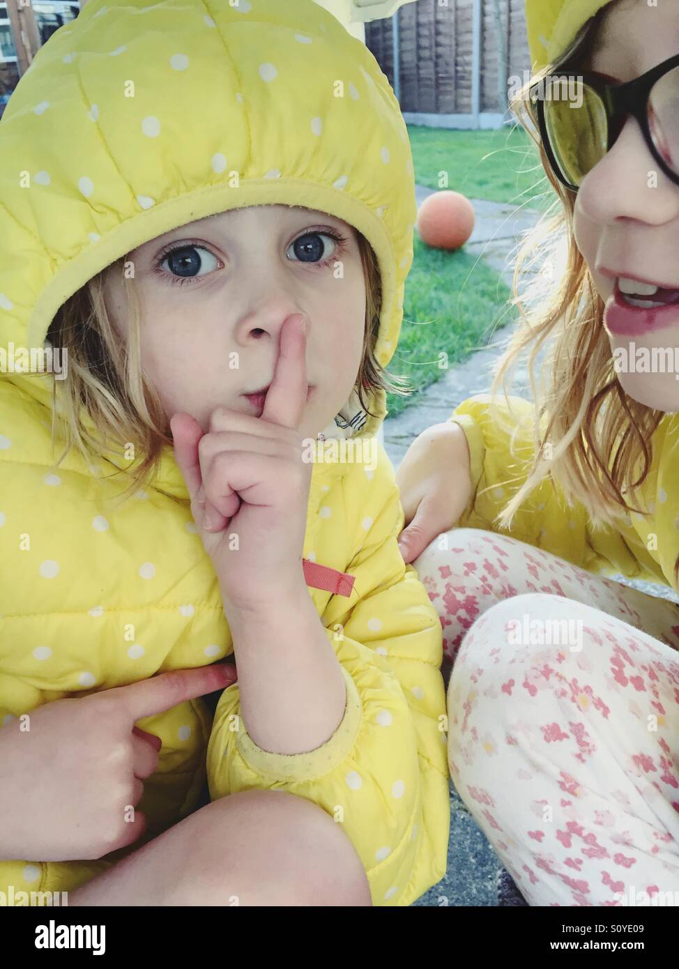 Hiding girls hi-res stock photography and images - Alamy