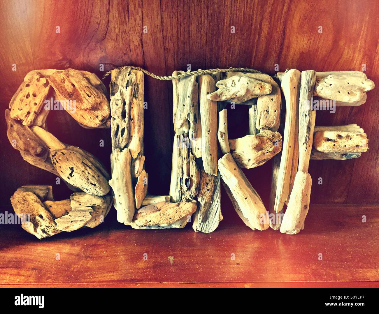 The word, "SURF", in a sculpture made from Hawaiian driftwood Stock ...