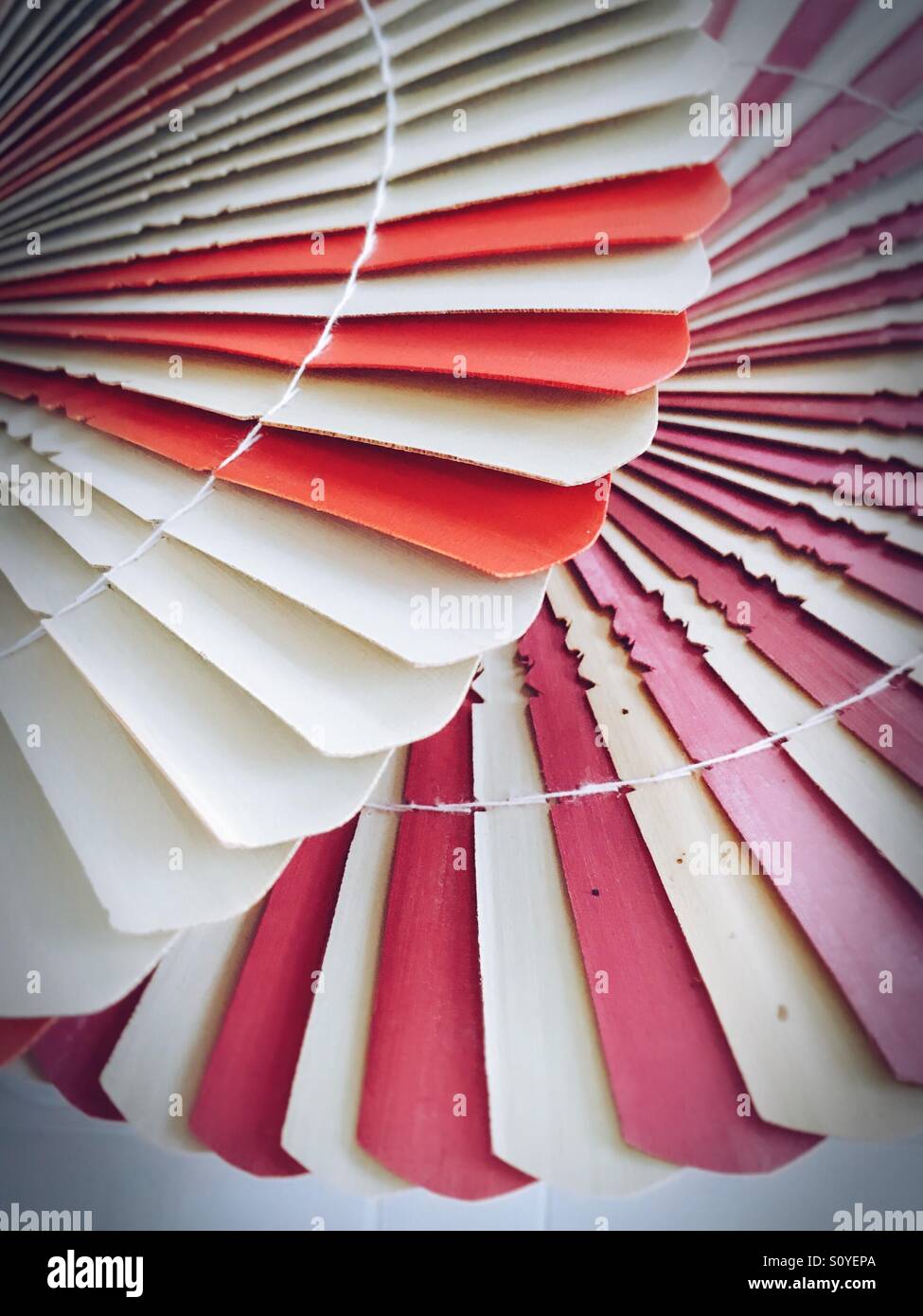 Colorful dried Palm leaf, handcraft fan is common in tropical countries ...