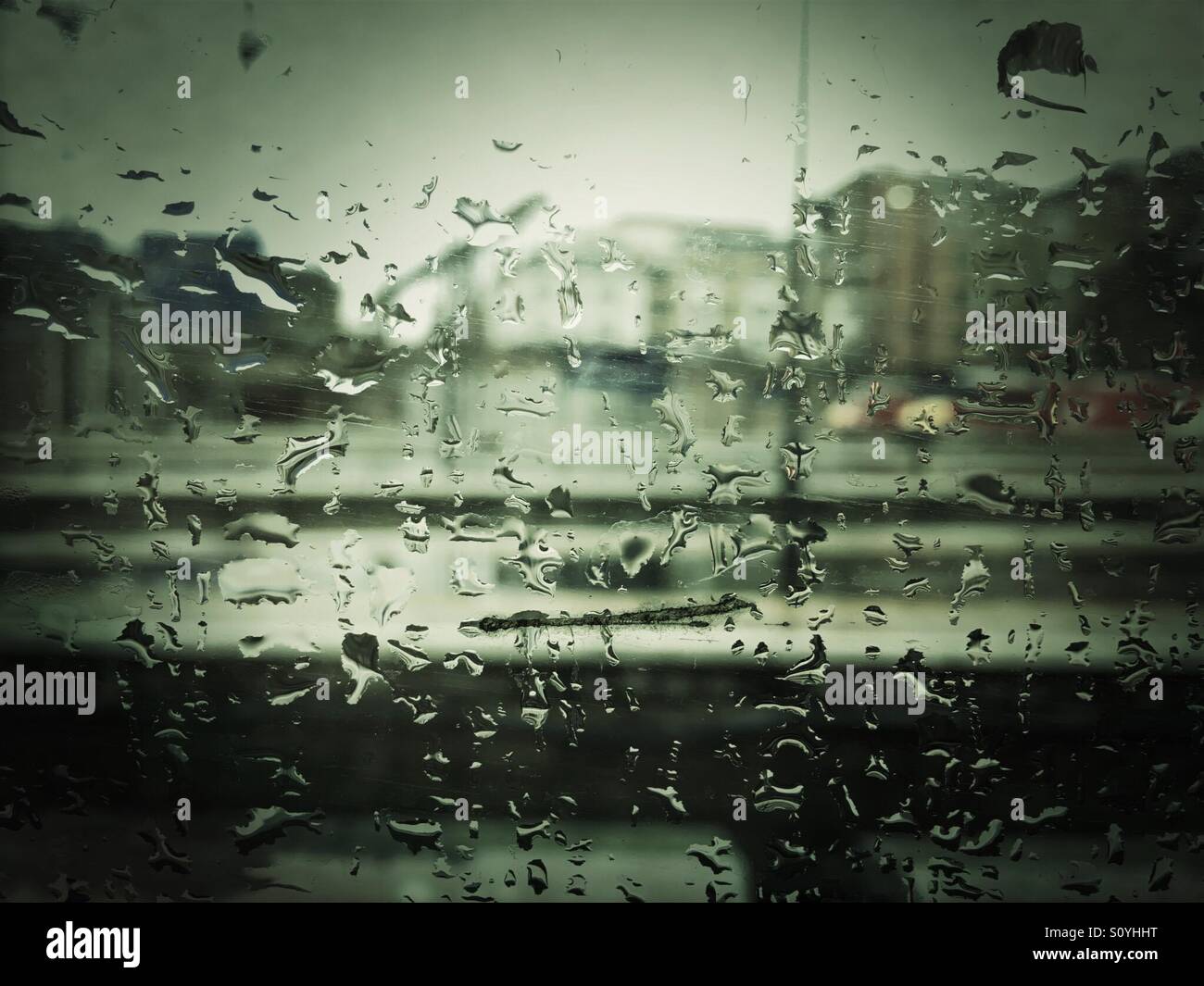 Rainy Train Platform through Window Stock Photo - Alamy