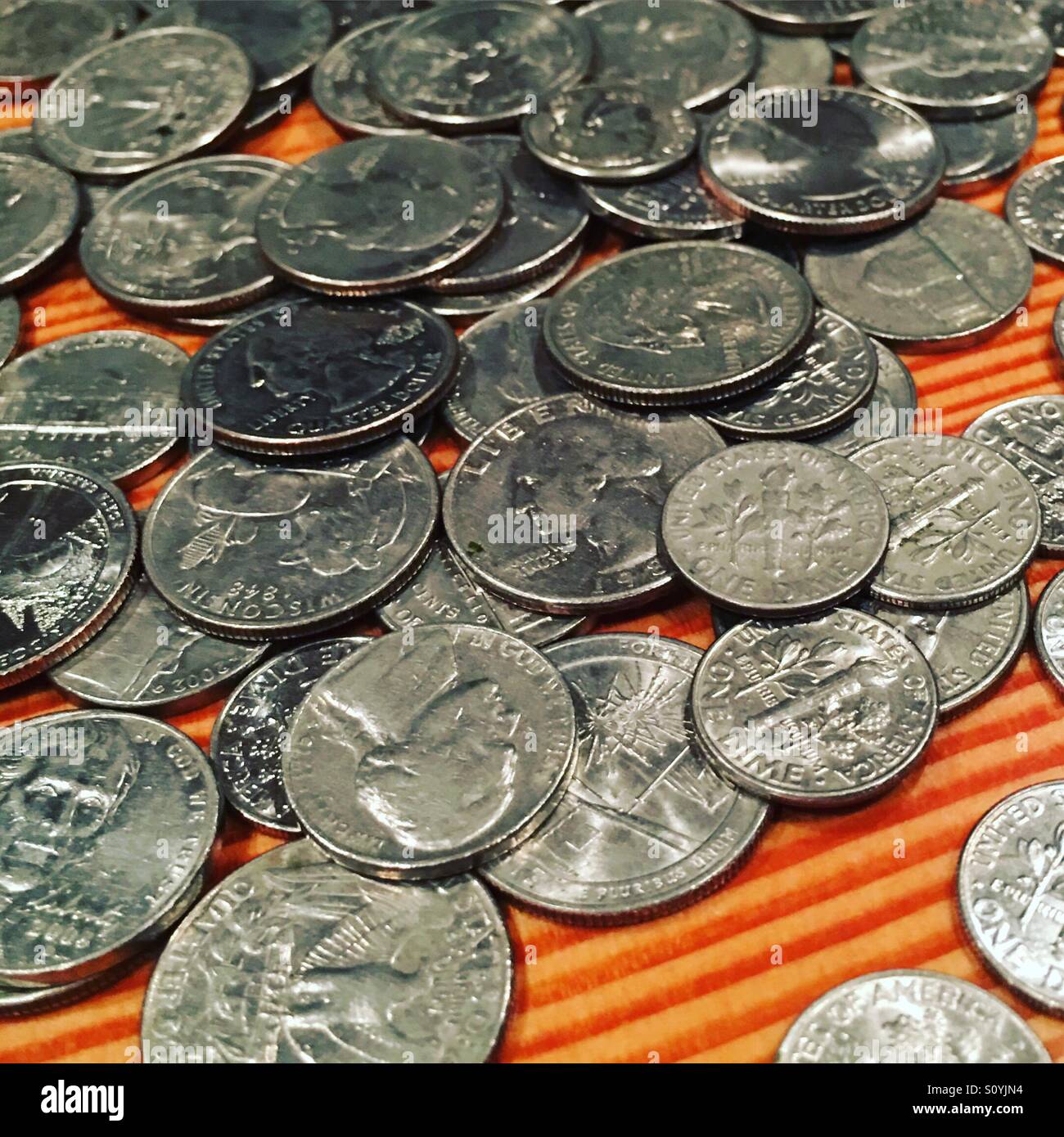 Pile of quarters hi-res stock photography and images - Alamy