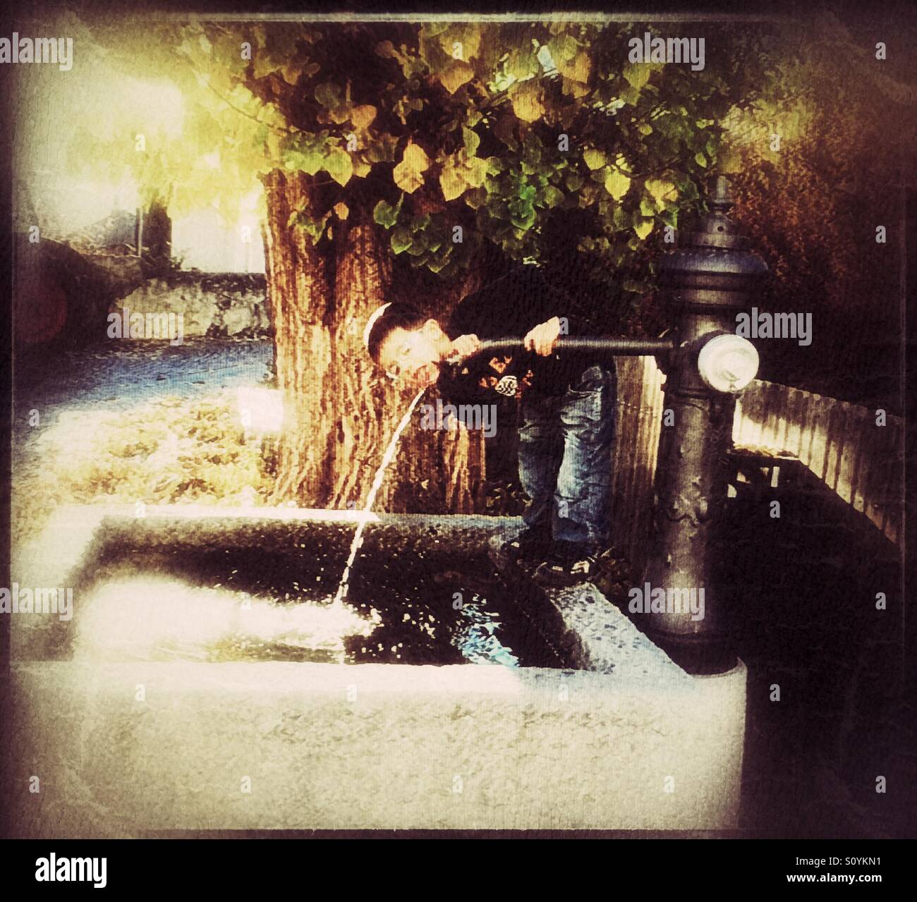 Man Drinking From A Water Fountain High Resolution Stock Photography ...