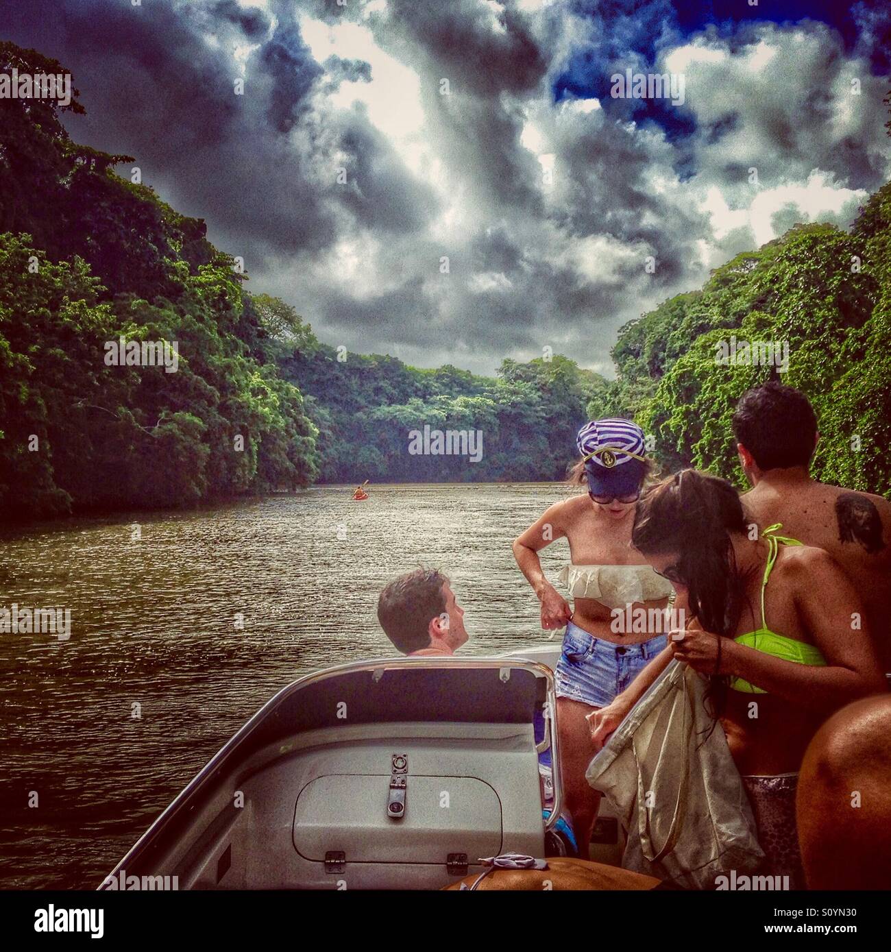 Guys with boat hi-res stock photography and images - Alamy