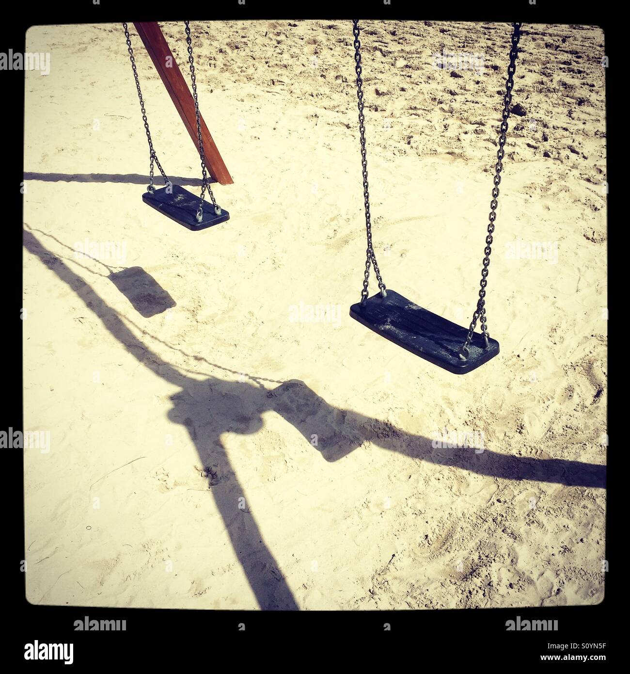 Empty swings on beach hi-res stock photography and images - Alamy