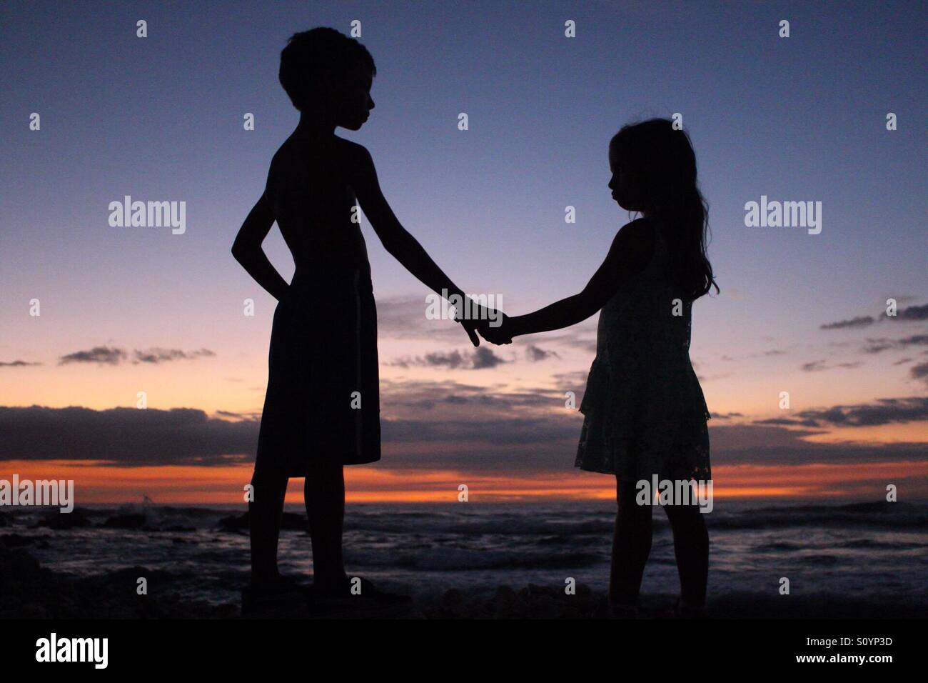 Sister and brother sunset hi-res stock photography and images - Alamy