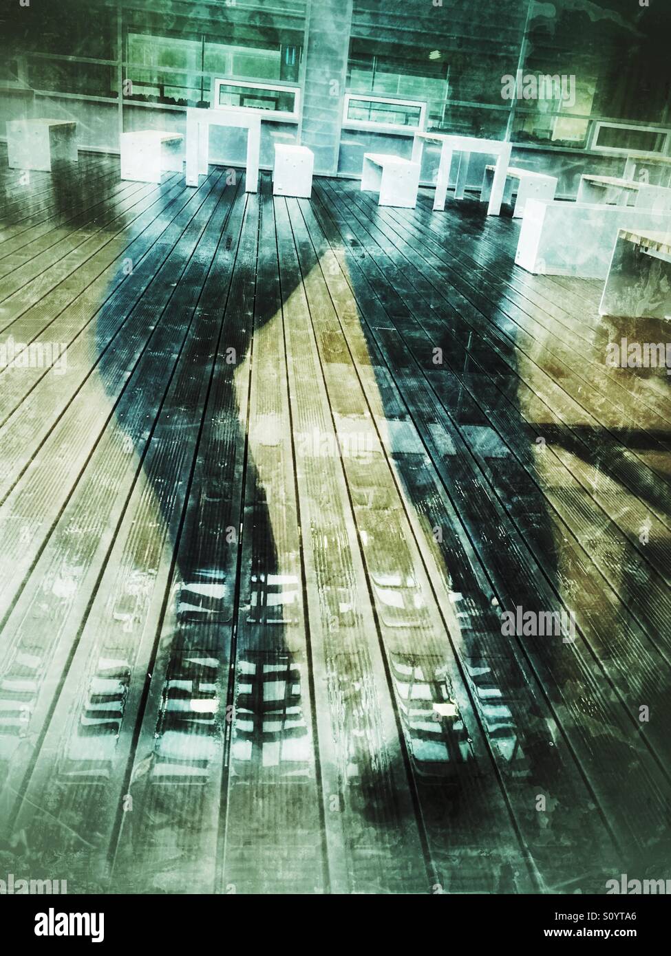 Legs reflected in a window Stock Photo - Alamy