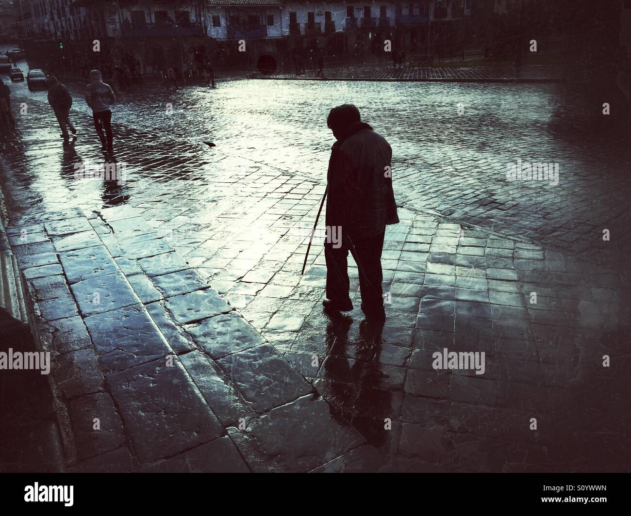 Sad Man Walking In The Rain