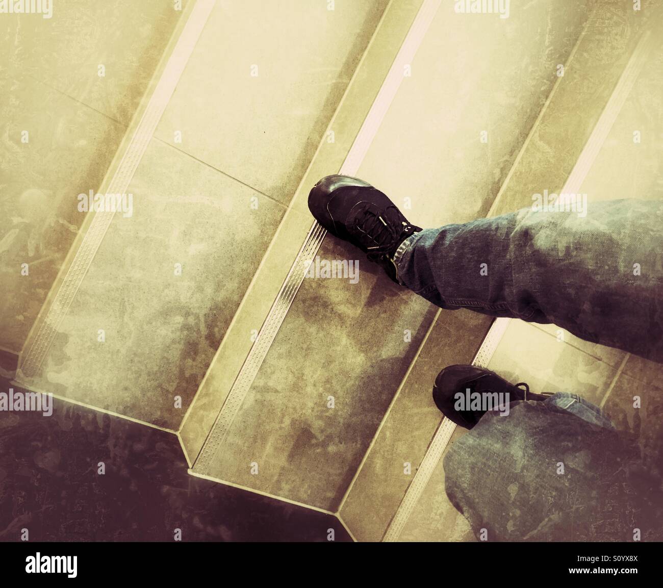 Going down the stairs Stock Photo - Alamy